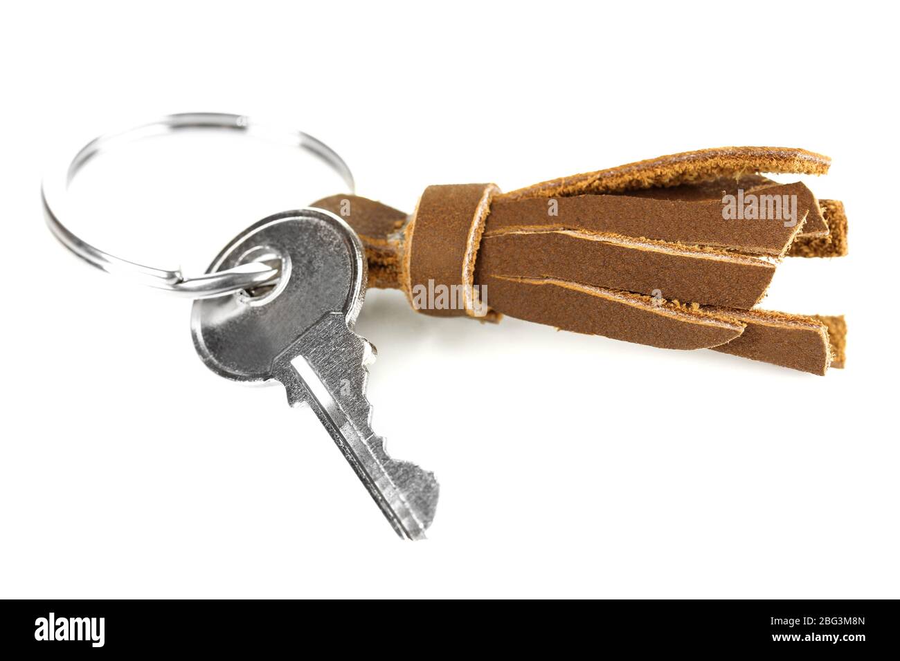 Key with leather trinket isolated on white Stock Photo - Alamy
