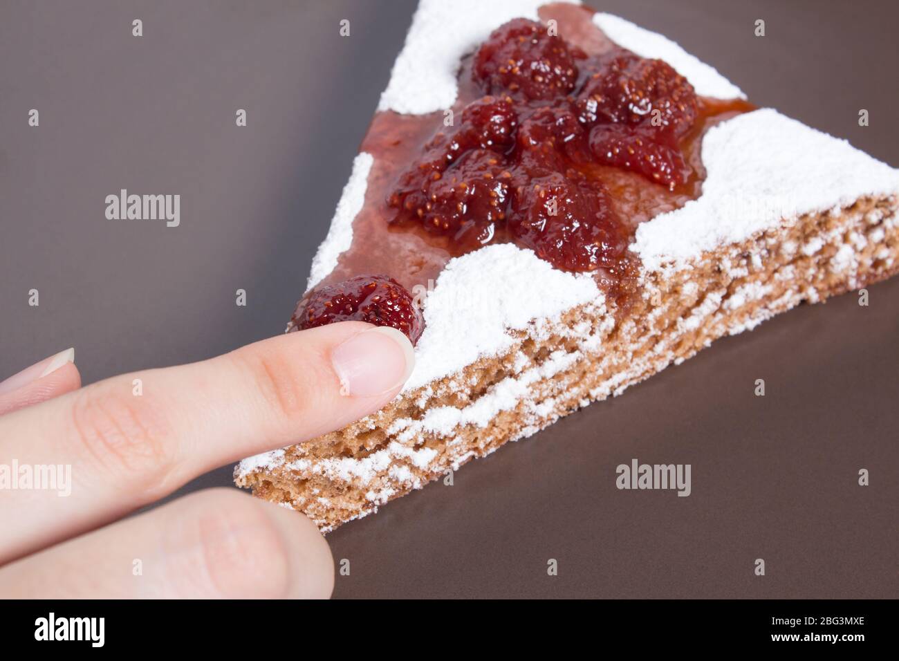 Hand take cake hi-res stock photography and images - Alamy