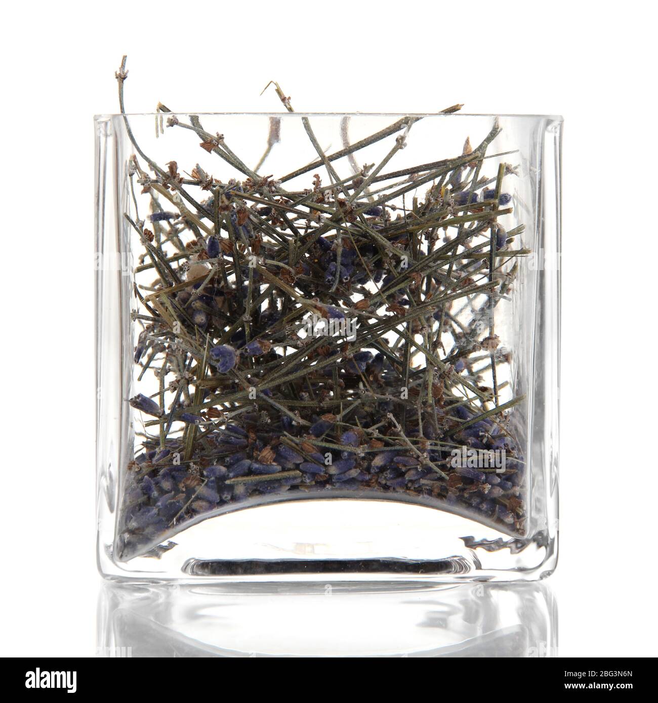 Dried herb in glass container isolated on white Stock Photo - Alamy