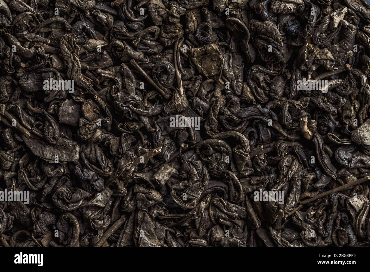 Texture of tea. Dry green tea leaves Stock Photo - Alamy