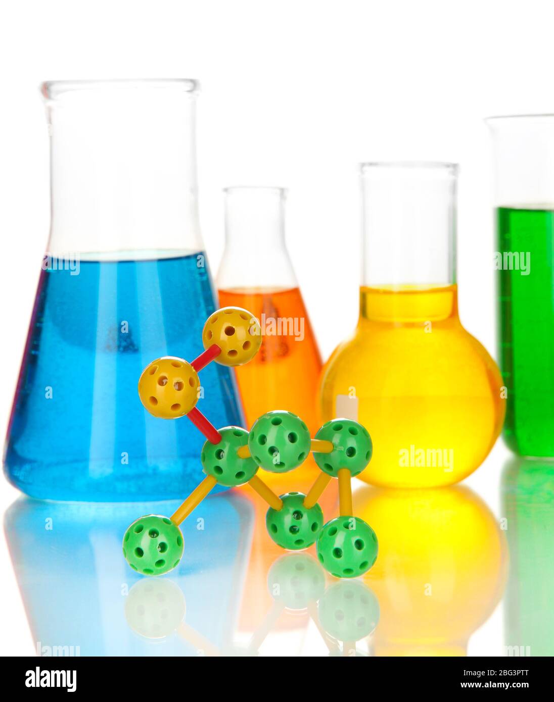 Molecule model and test tubes with colorful liquids isolated on white ...