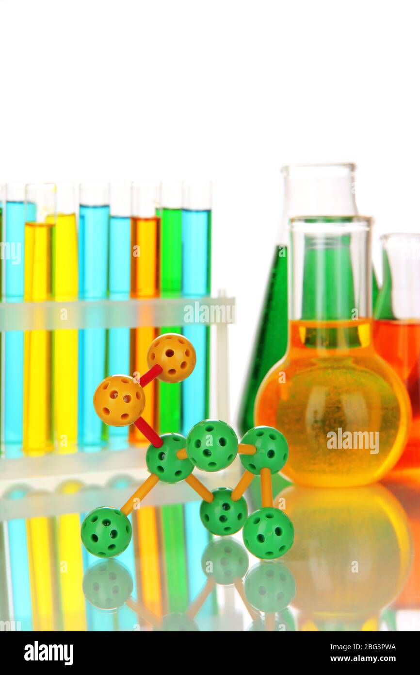 Molecule model and test tubes with colorful liquids isolated on white ...
