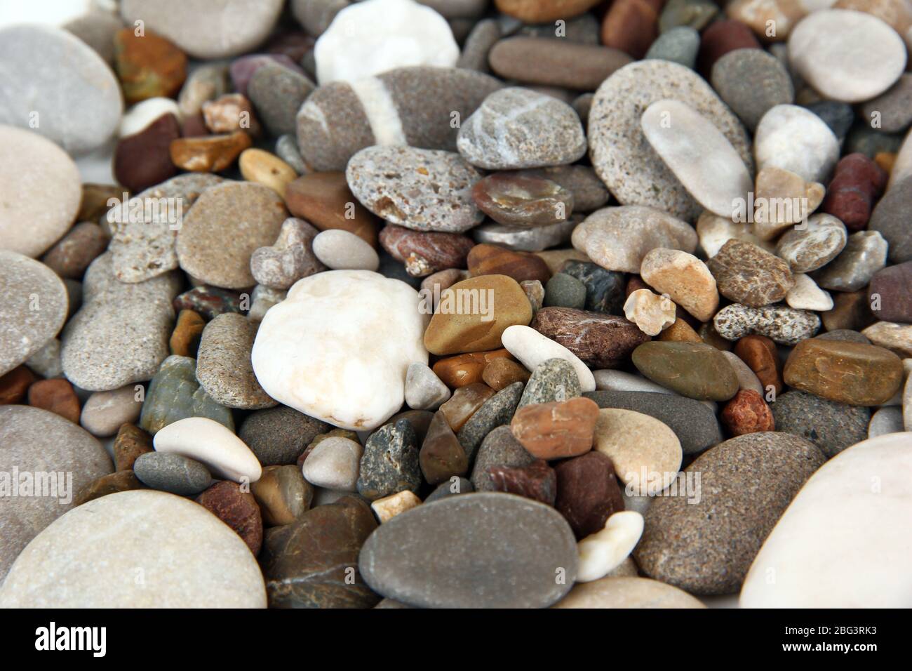 Sea stones background Stock Photo - Alamy