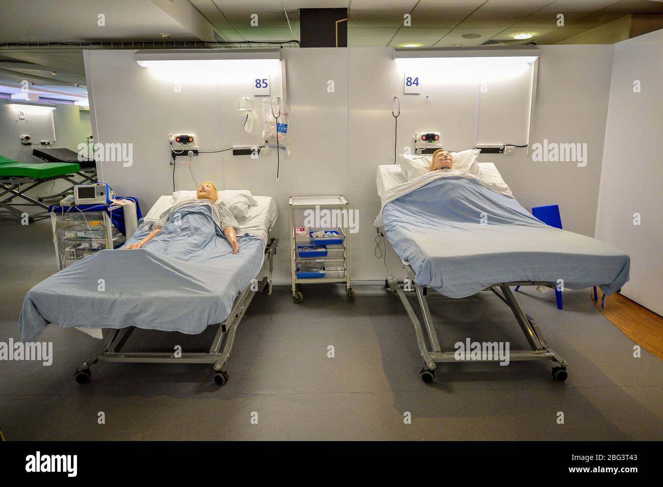 Dummy patients are laid in beds as they are used inside a ward as part ...