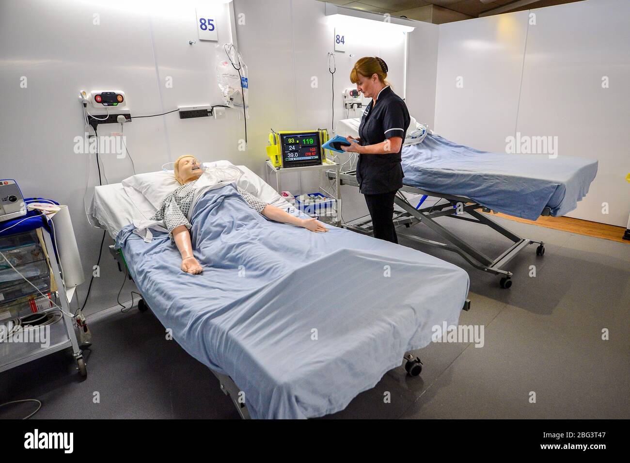 A simulation technician takes part in medical training inside a ward at ...