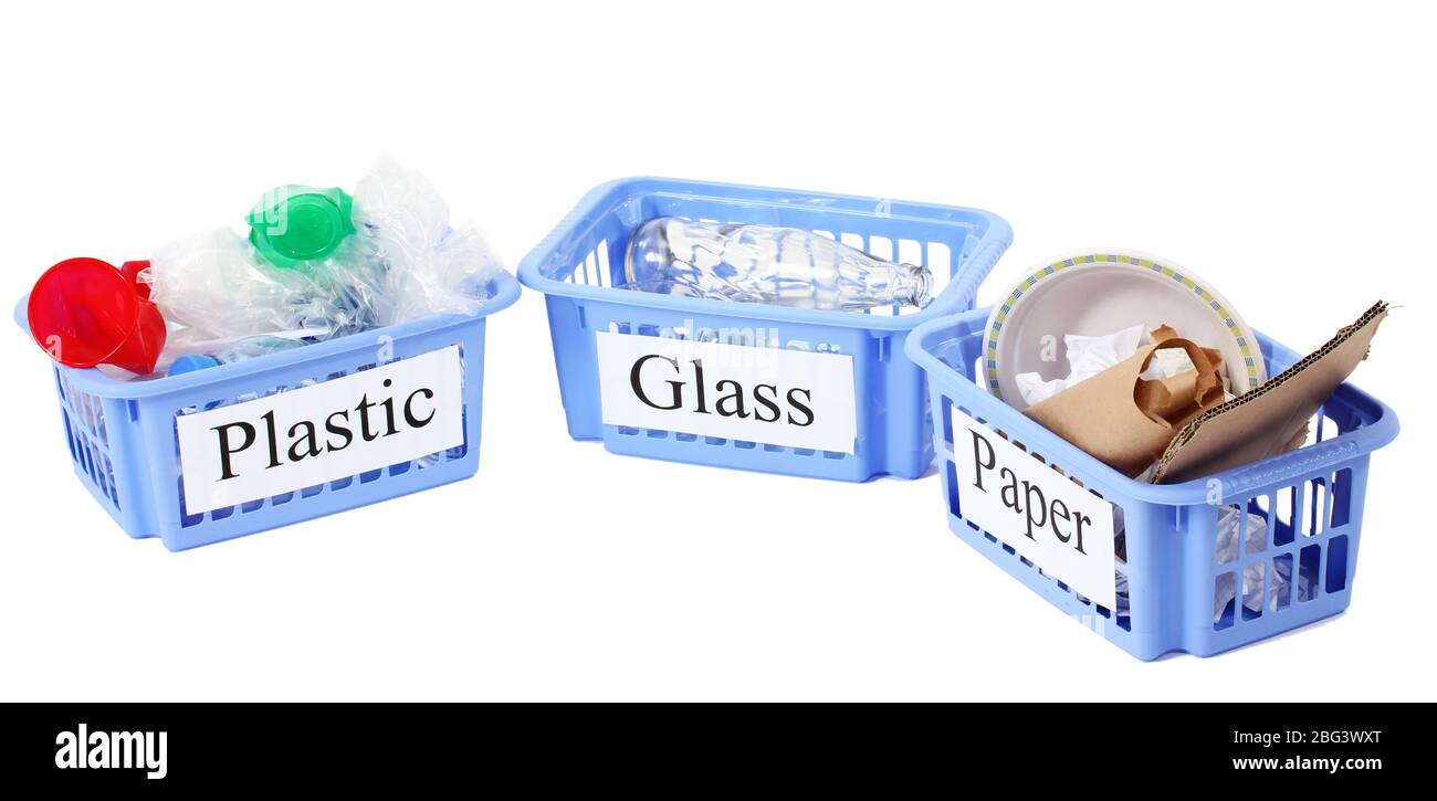 Three baskets of assorted debris isolated on white Stock Photo - Alamy