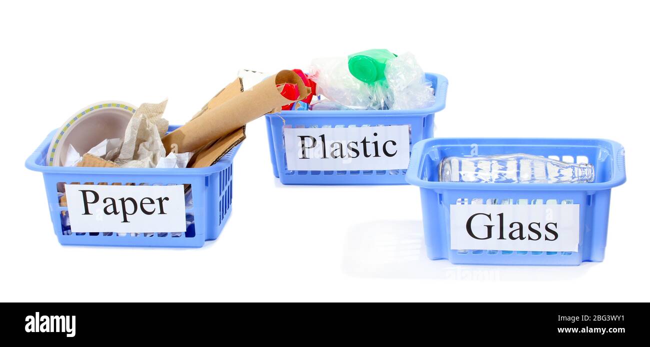 Three baskets of assorted debris isolated on white Stock Photo - Alamy