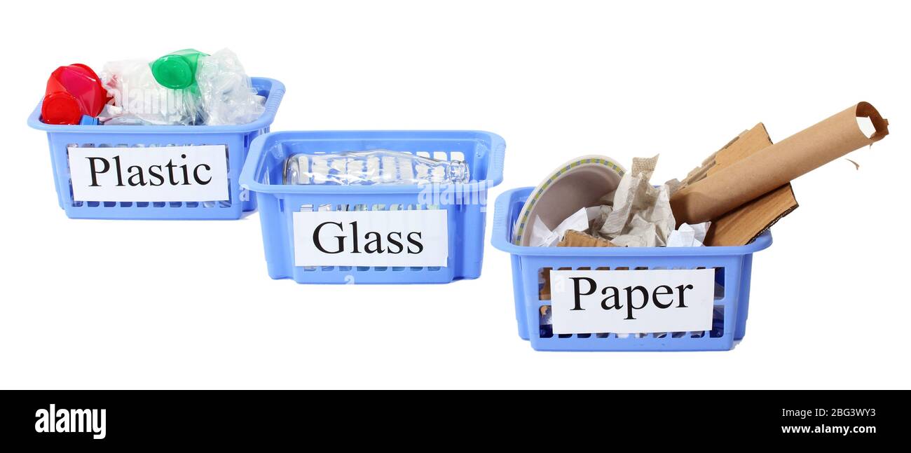 Three baskets of assorted debris isolated on white Stock Photo - Alamy