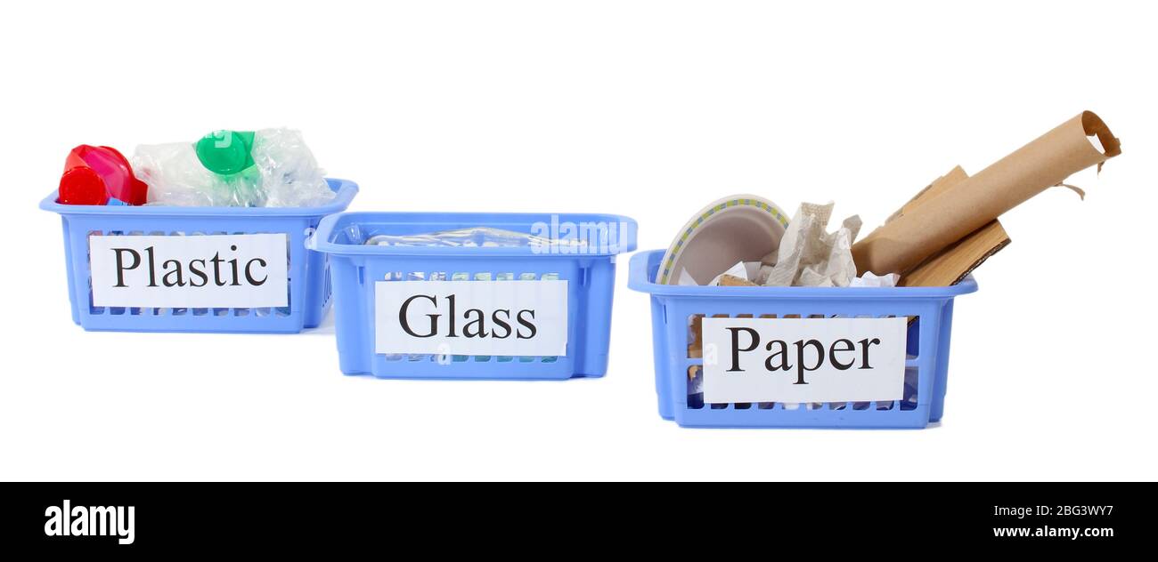 Three baskets of assorted debris isolated on white Stock Photo - Alamy