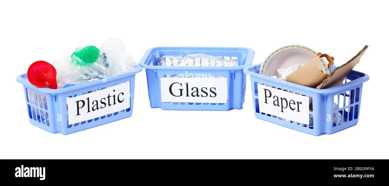 Three baskets of assorted debris isolated on white Stock Photo - Alamy
