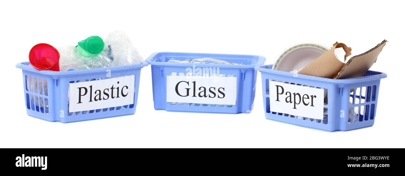 Three baskets of assorted debris isolated on white Stock Photo - Alamy