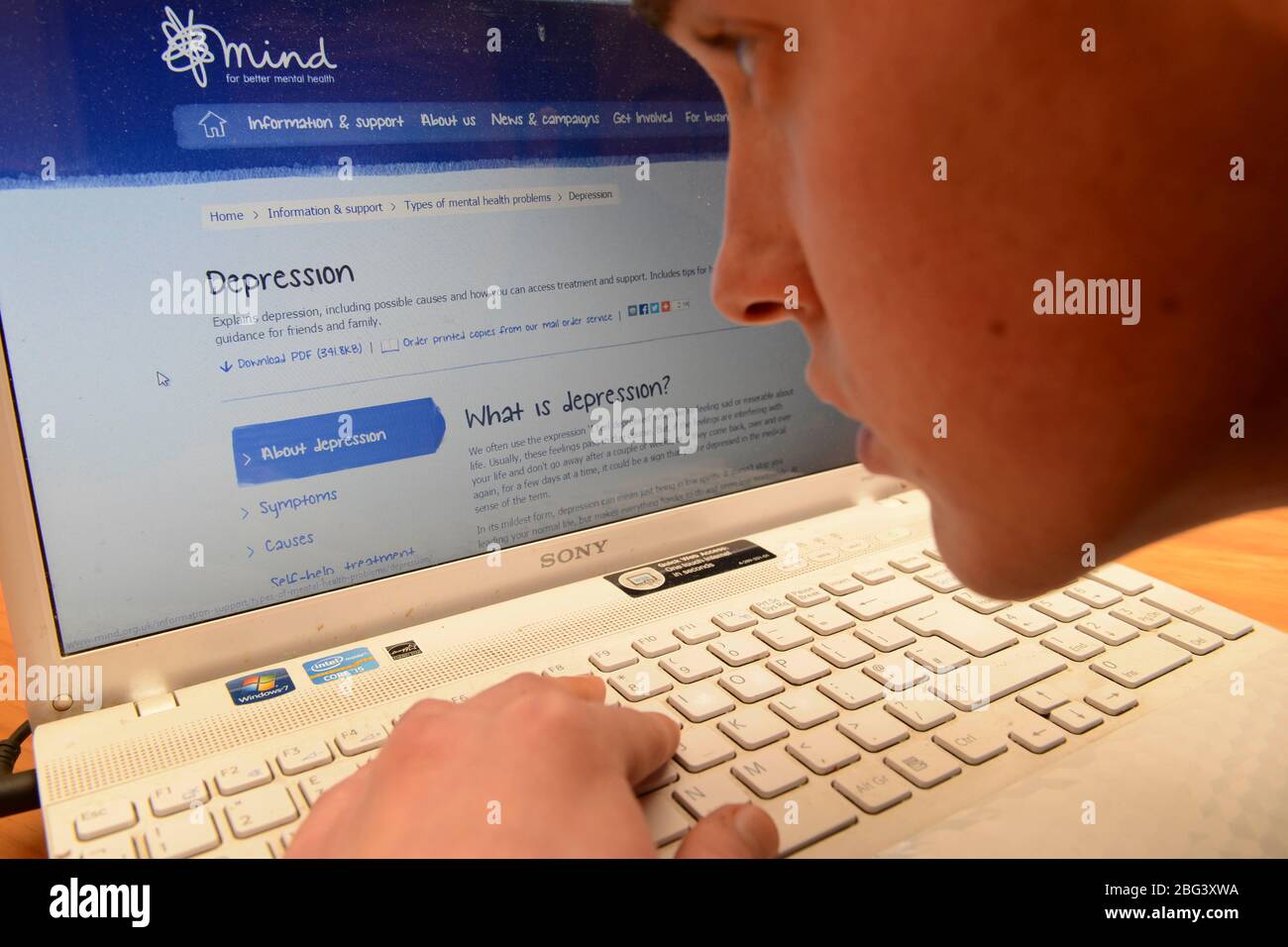 A young man searches the mind.org.uk website to find information on ...