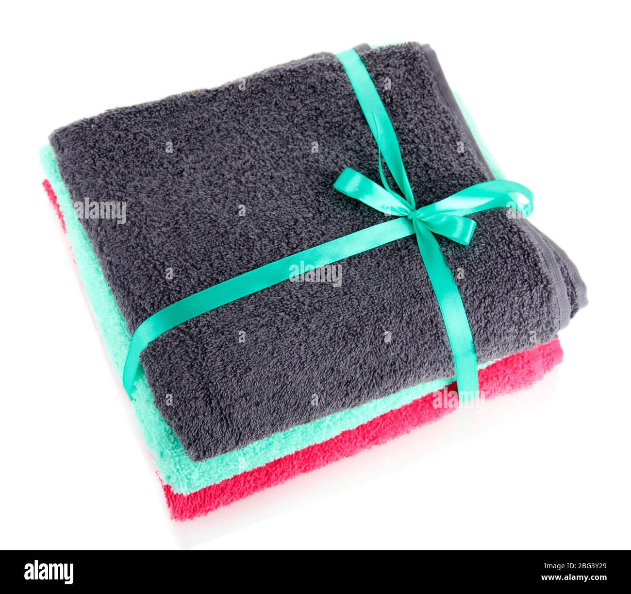 Towels tied with ribbon isolated on white Stock Photo - Alamy
