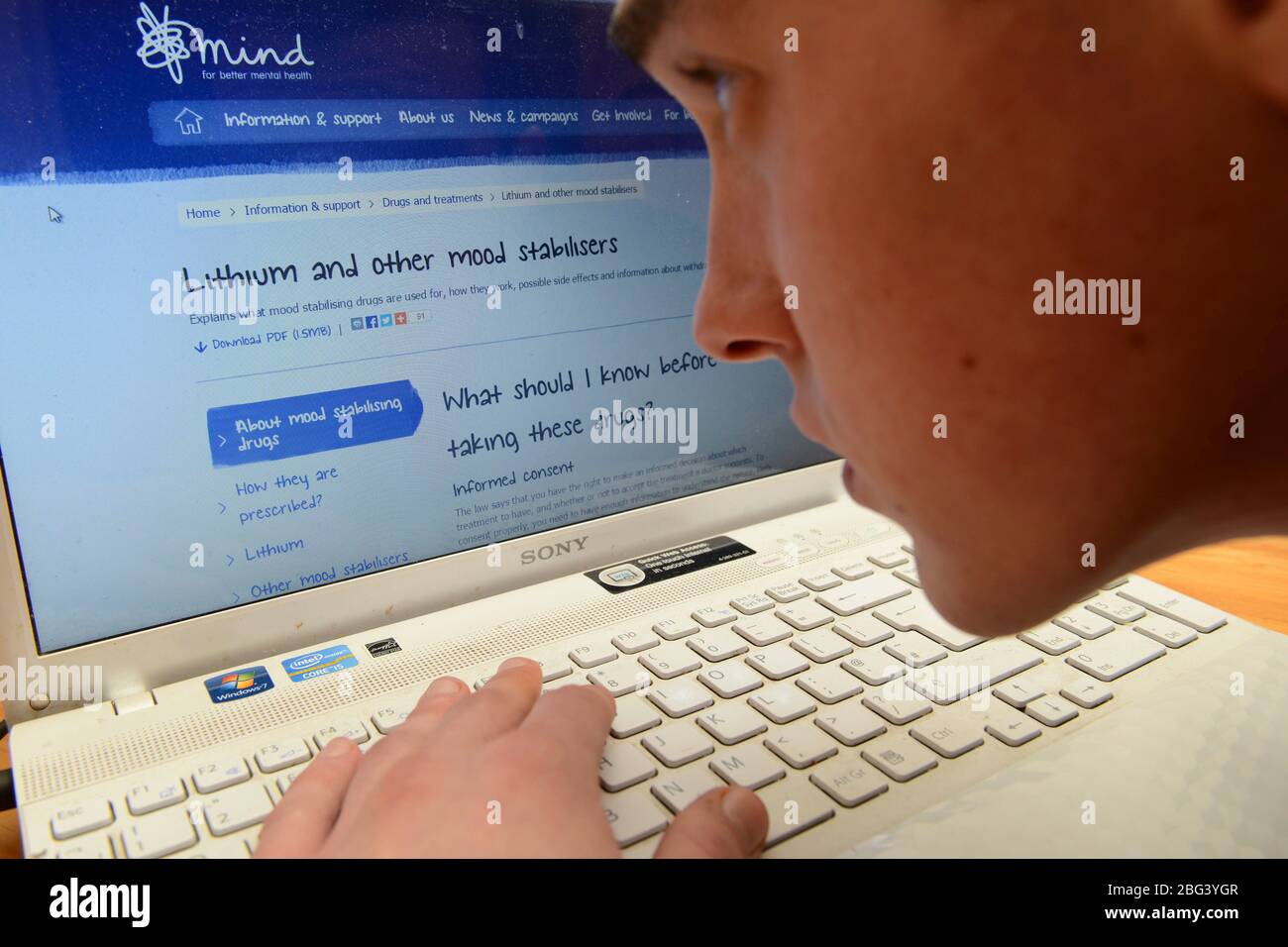 A young man searches the mind.org.uk website to find information on ...