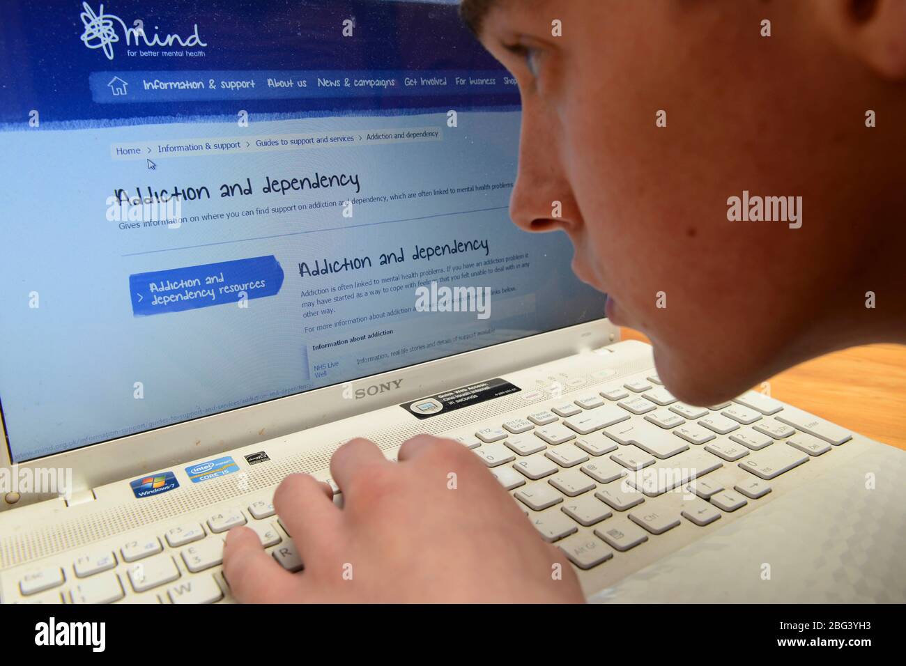A young man searches the mind.org.uk website to find information on ...