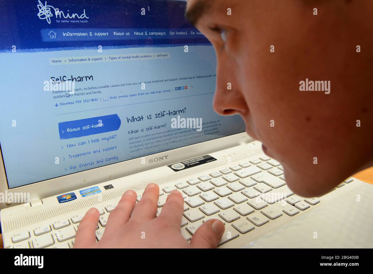A young man searches the mind.org.uk website to find information on ...