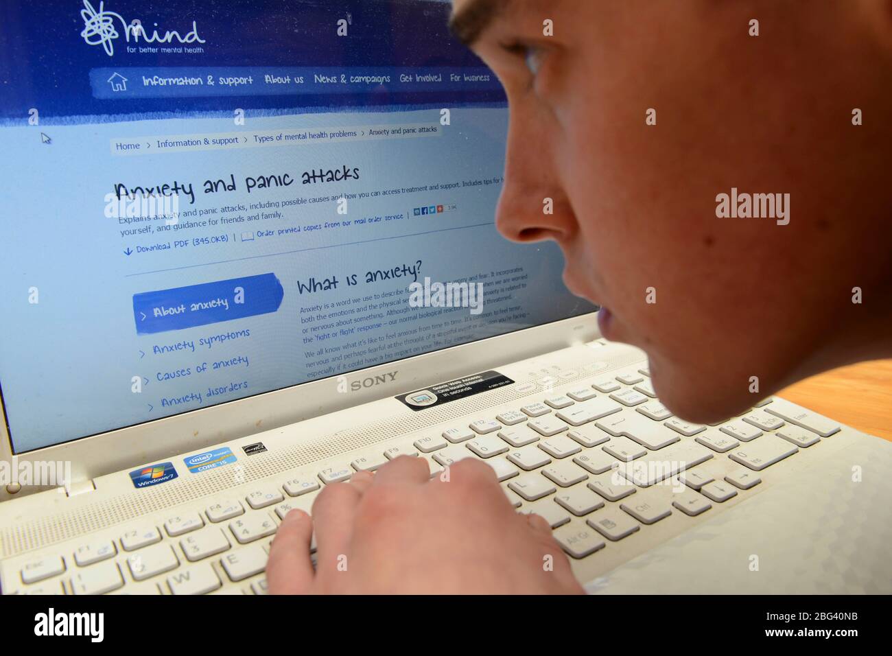 A young man searches the mind.org.uk website to find information on ...