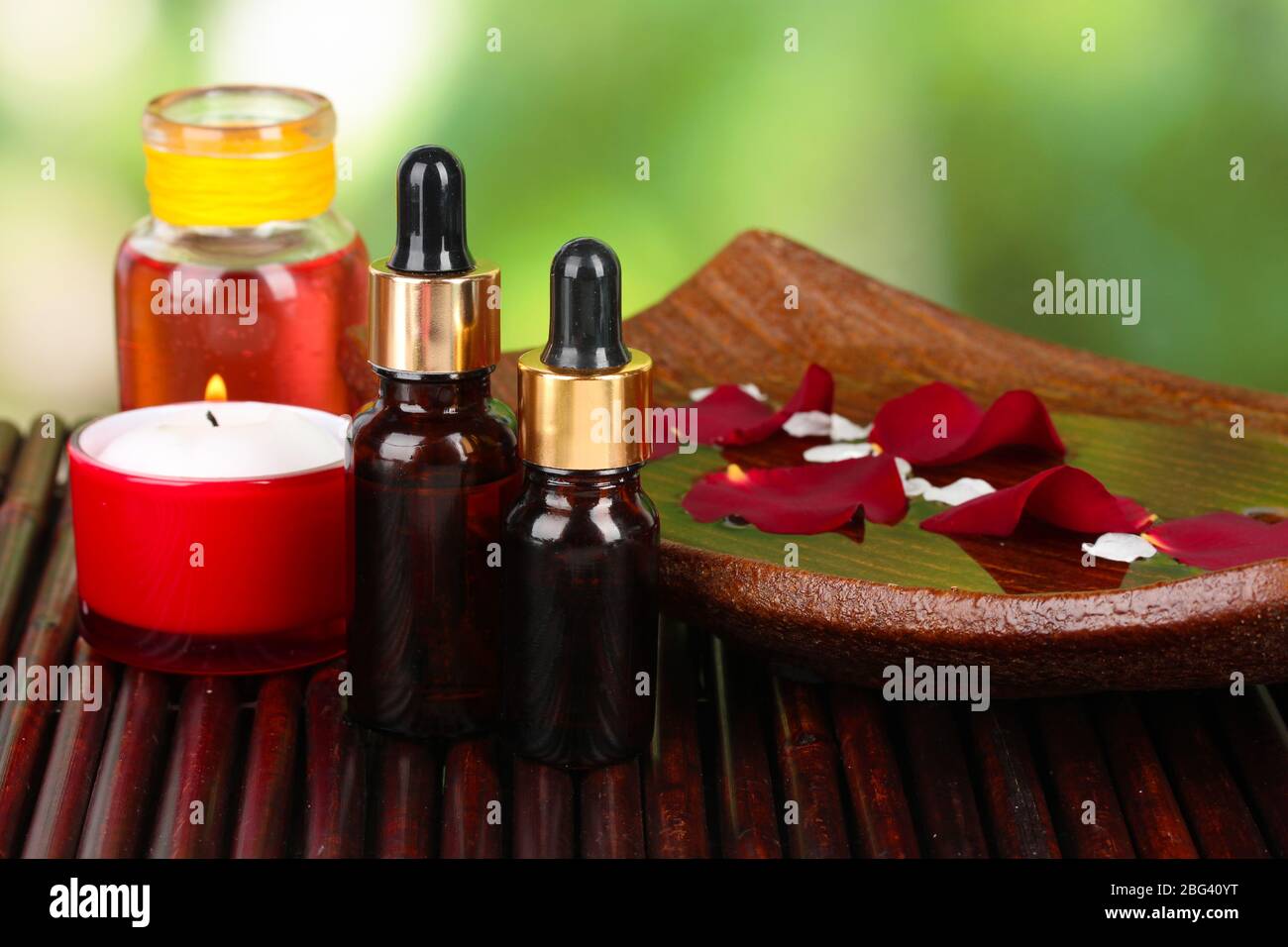 Spa composition with aroma oils on table on bright background Stock ...