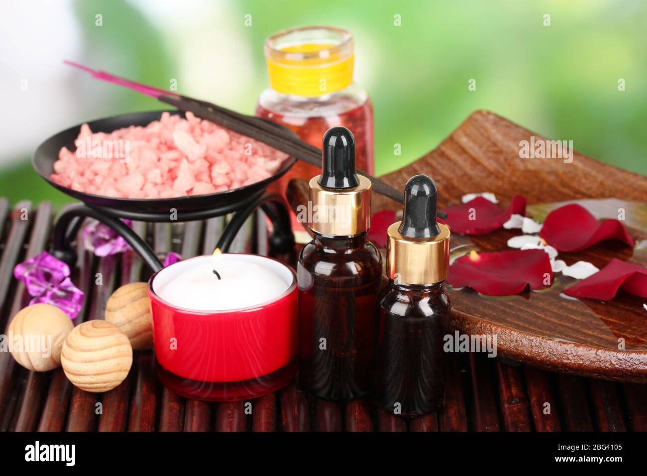 Spa composition with aroma oils on table on bright background Stock ...