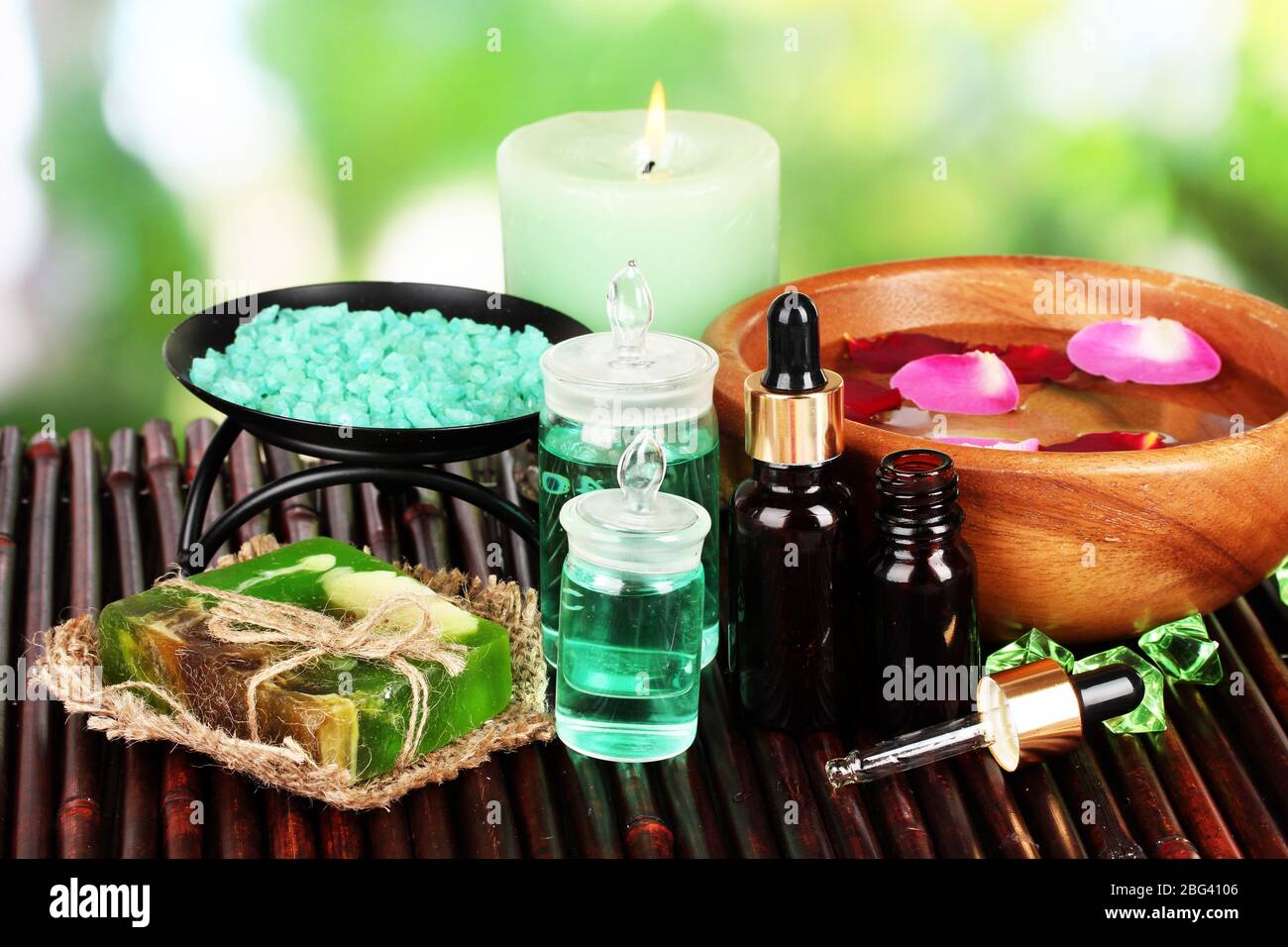 Spa composition with aroma oils on table on bright background Stock ...