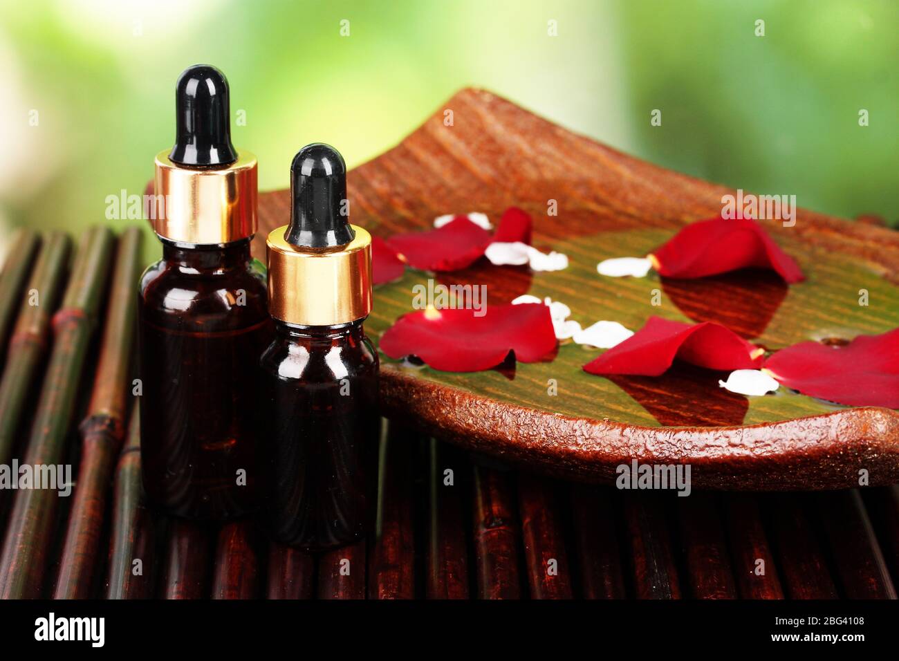 Spa composition with aroma oils on table on bright background Stock ...
