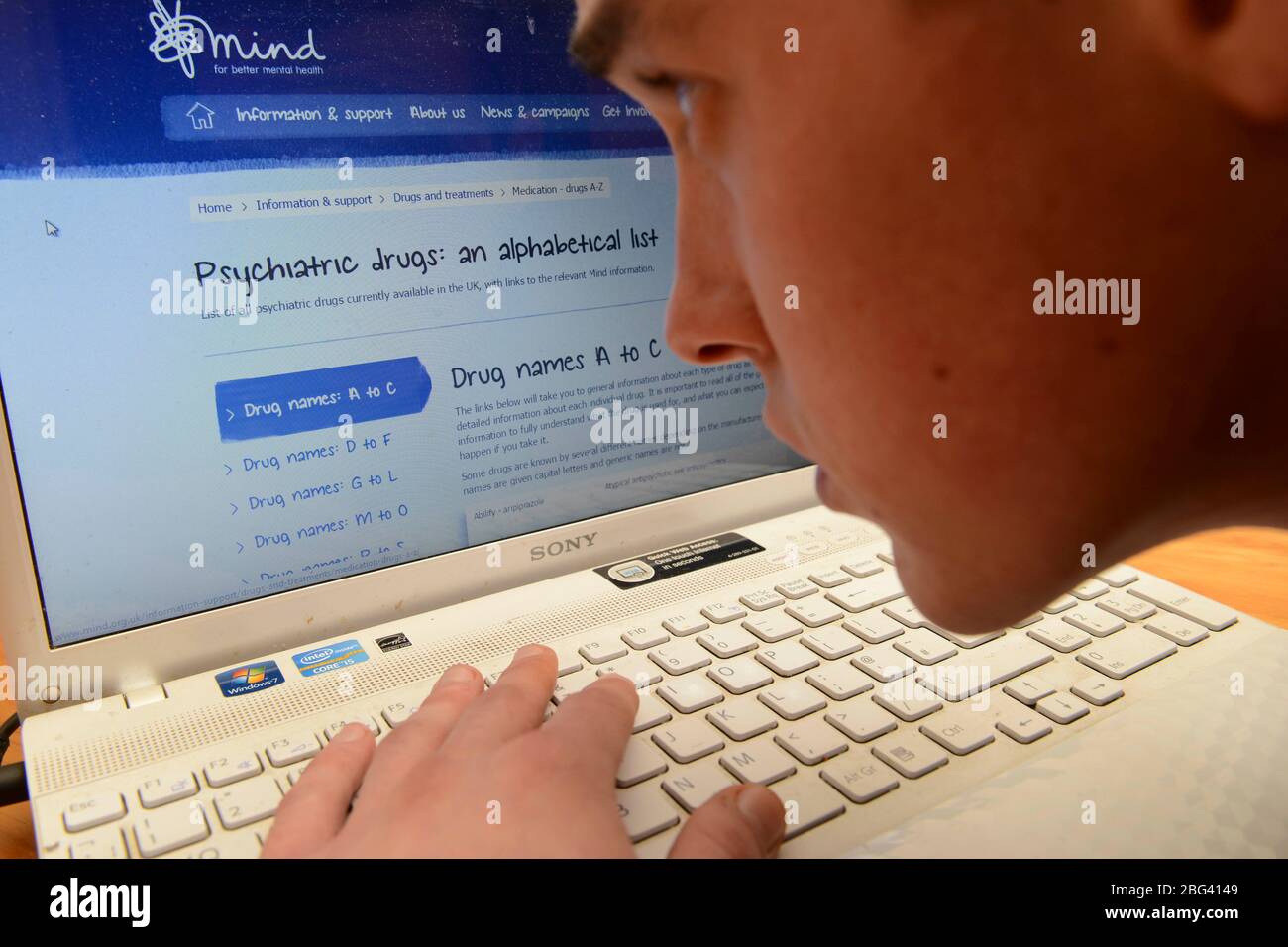 A young man searches the mind.org.uk website to find information on ...