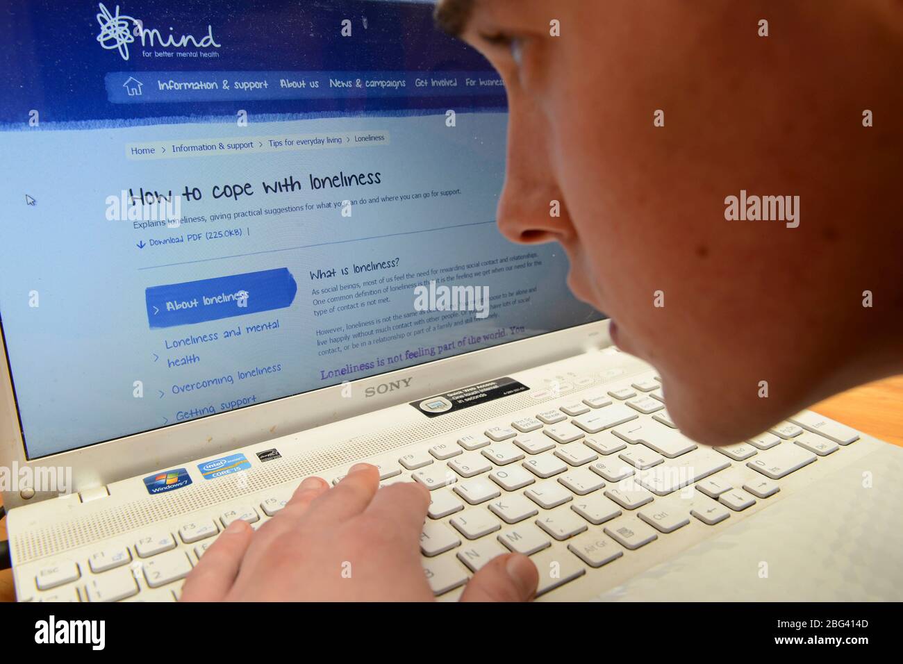 A young man searches the mind.org.uk website to find information on ...