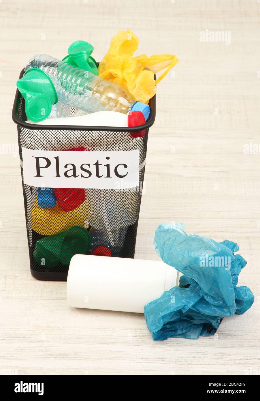 Bucket for waste sorting on room background Stock Photo - Alamy
