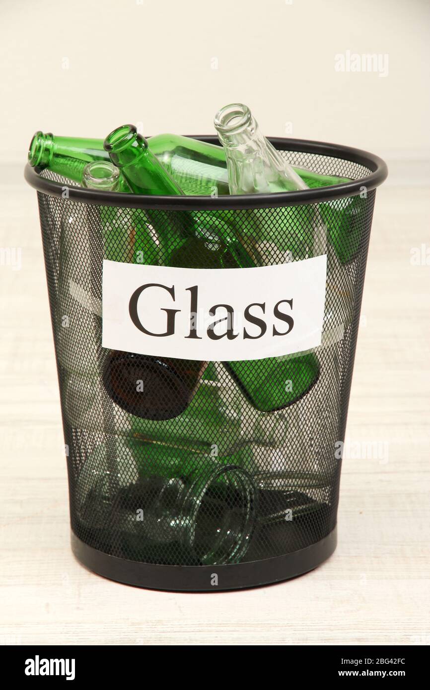 Bucket for waste sorting on room background Stock Photo - Alamy