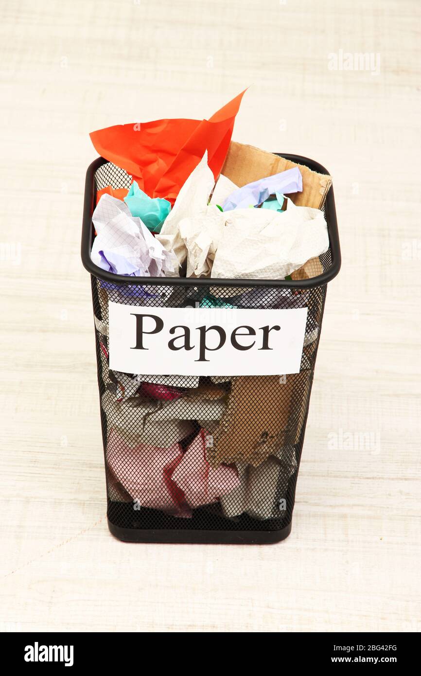 Bucket for waste sorting on room background Stock Photo - Alamy