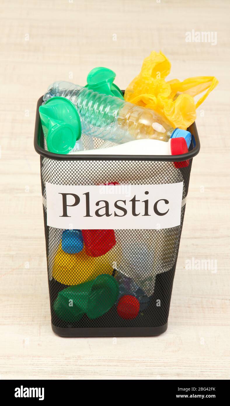 Bucket for waste sorting on room background Stock Photo - Alamy