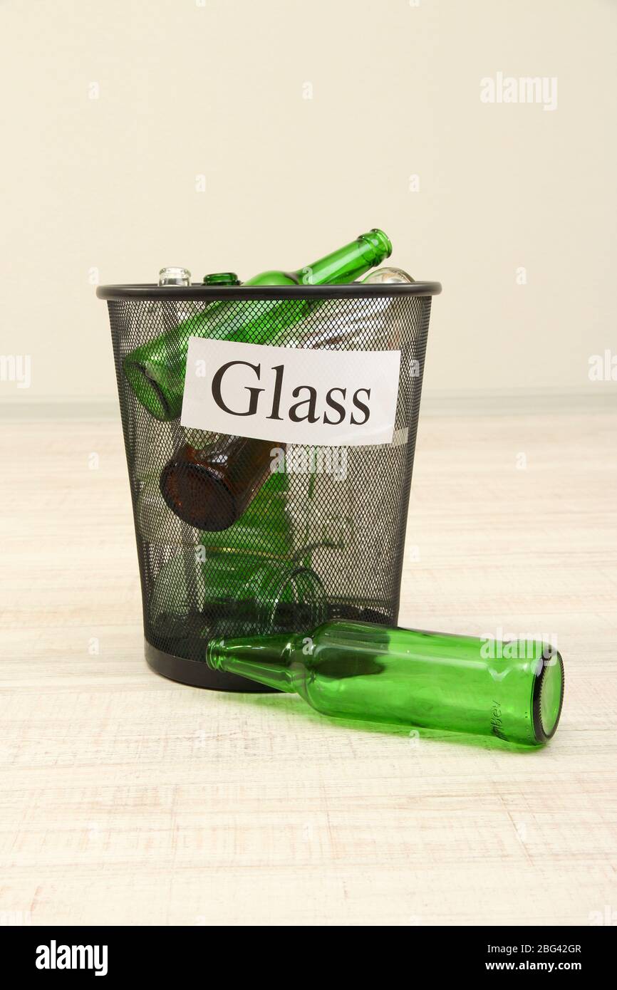 Bucket for waste sorting on room background Stock Photo - Alamy