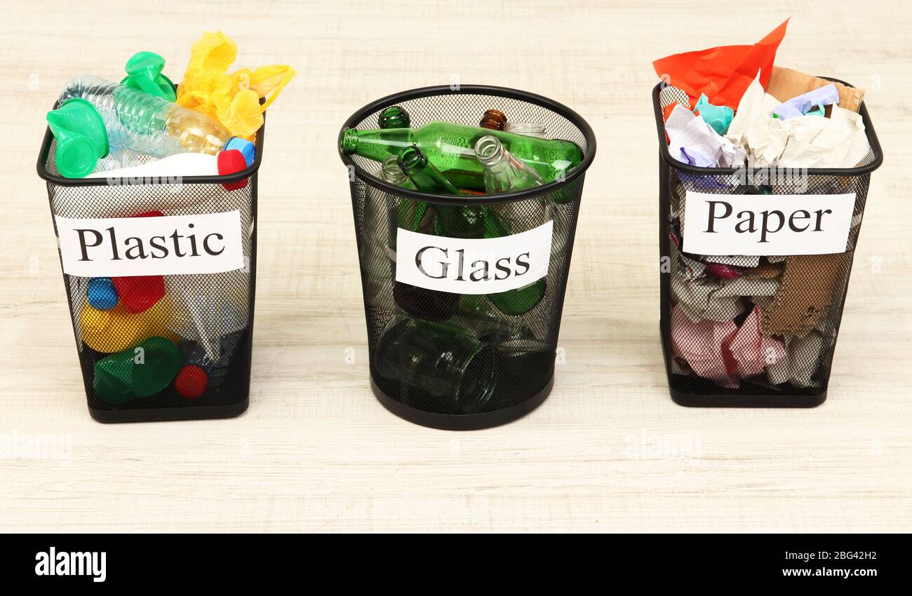 Buckets for waste sorting on room background Stock Photo - Alamy