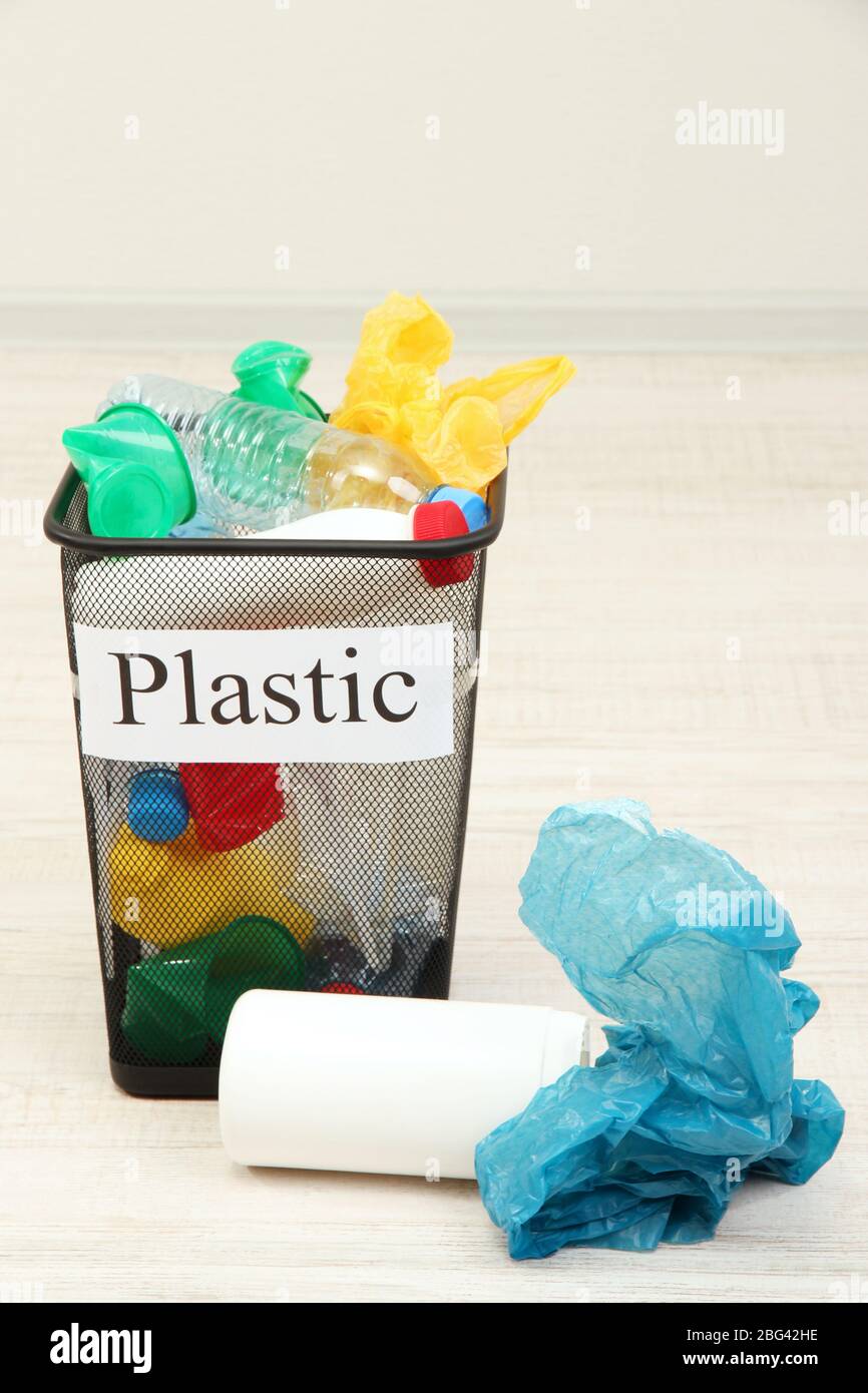 Bucket for waste sorting on room background Stock Photo - Alamy