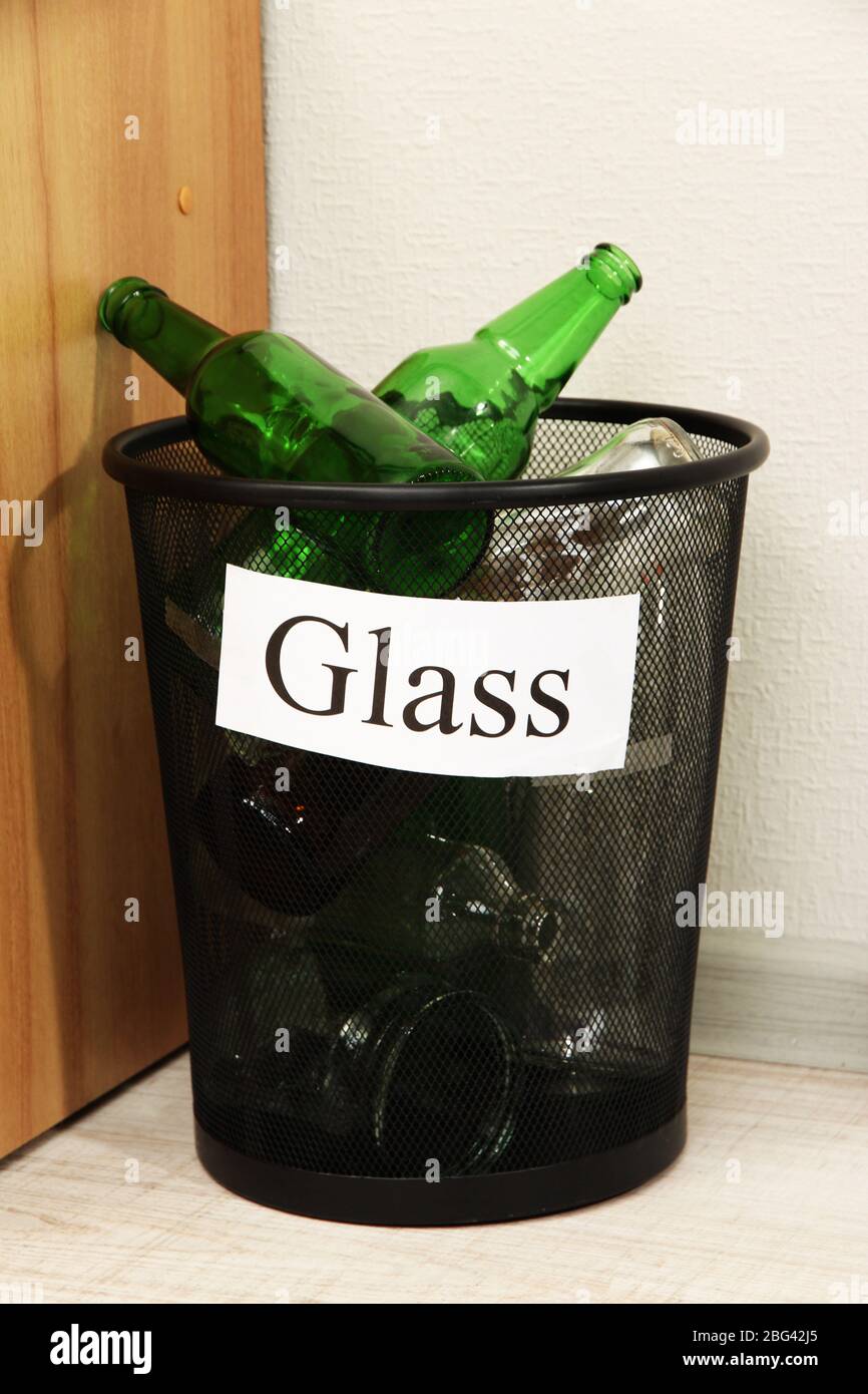 Bucket for waste sorting on room background Stock Photo - Alamy