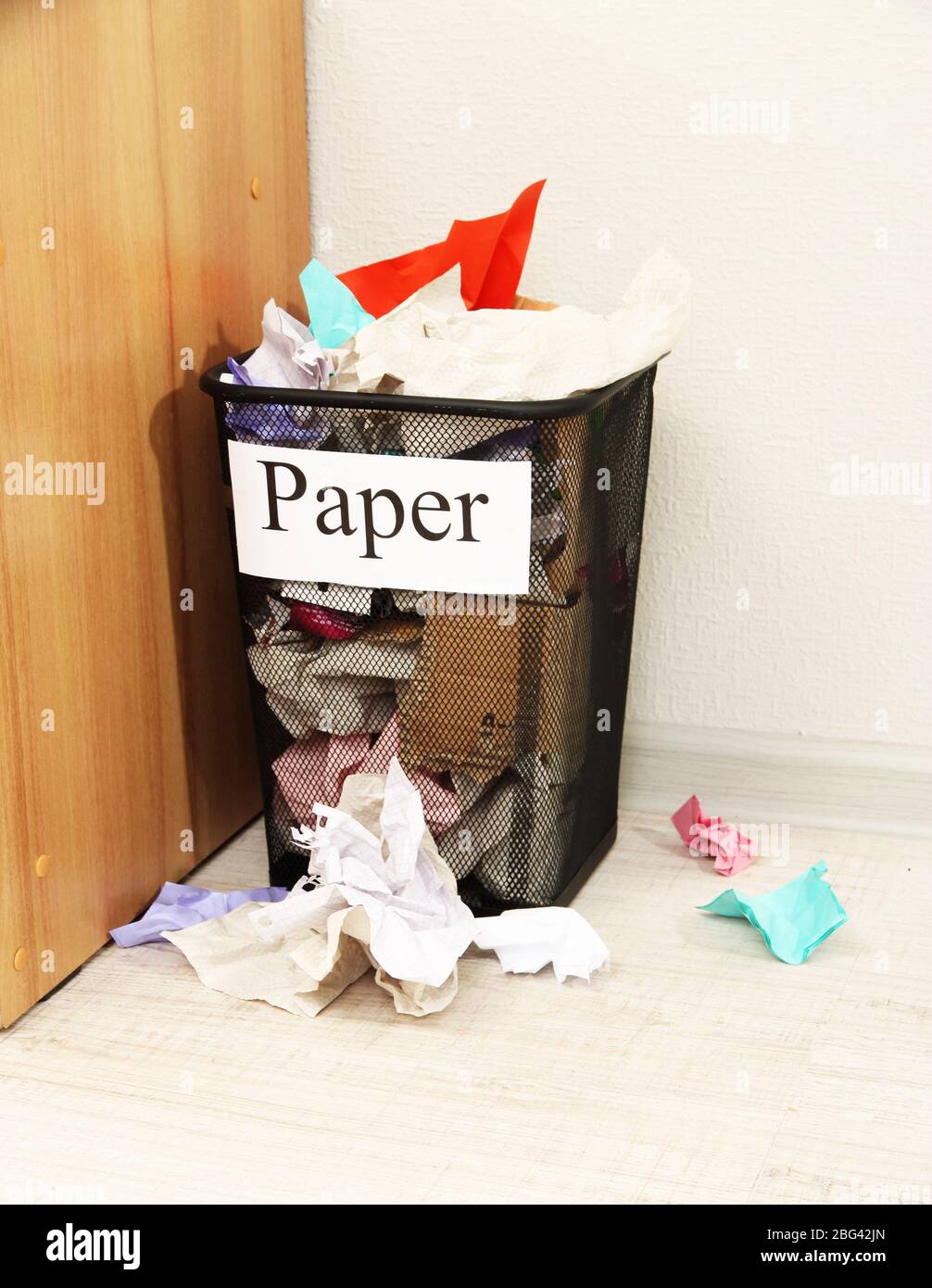 Bucket for waste sorting on room background Stock Photo - Alamy