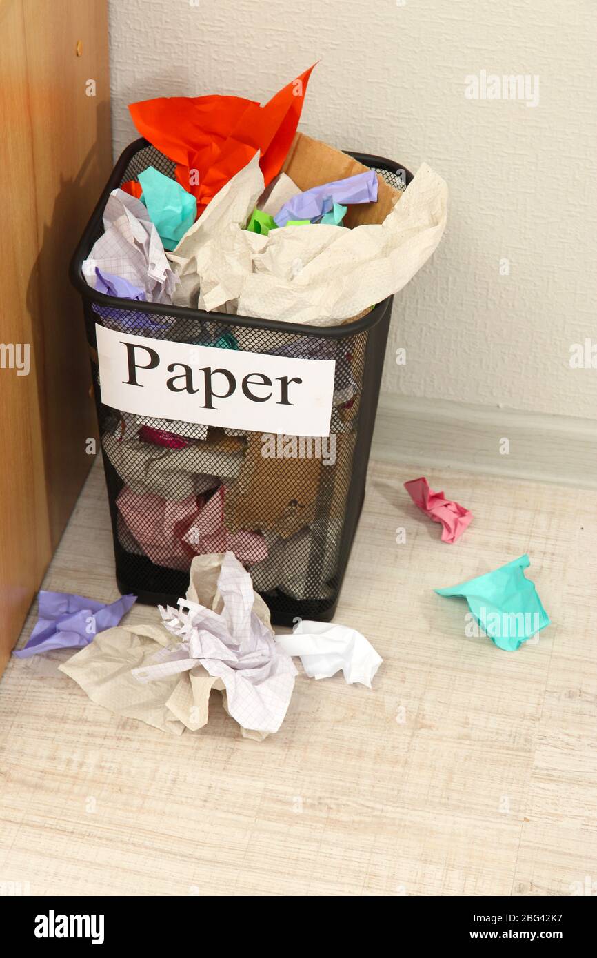 Bucket for waste sorting on room background Stock Photo - Alamy