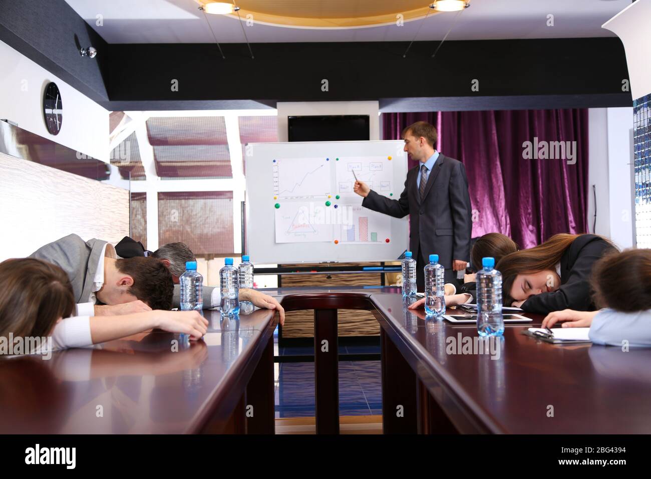Bored business training at office Stock Photo - Alamy