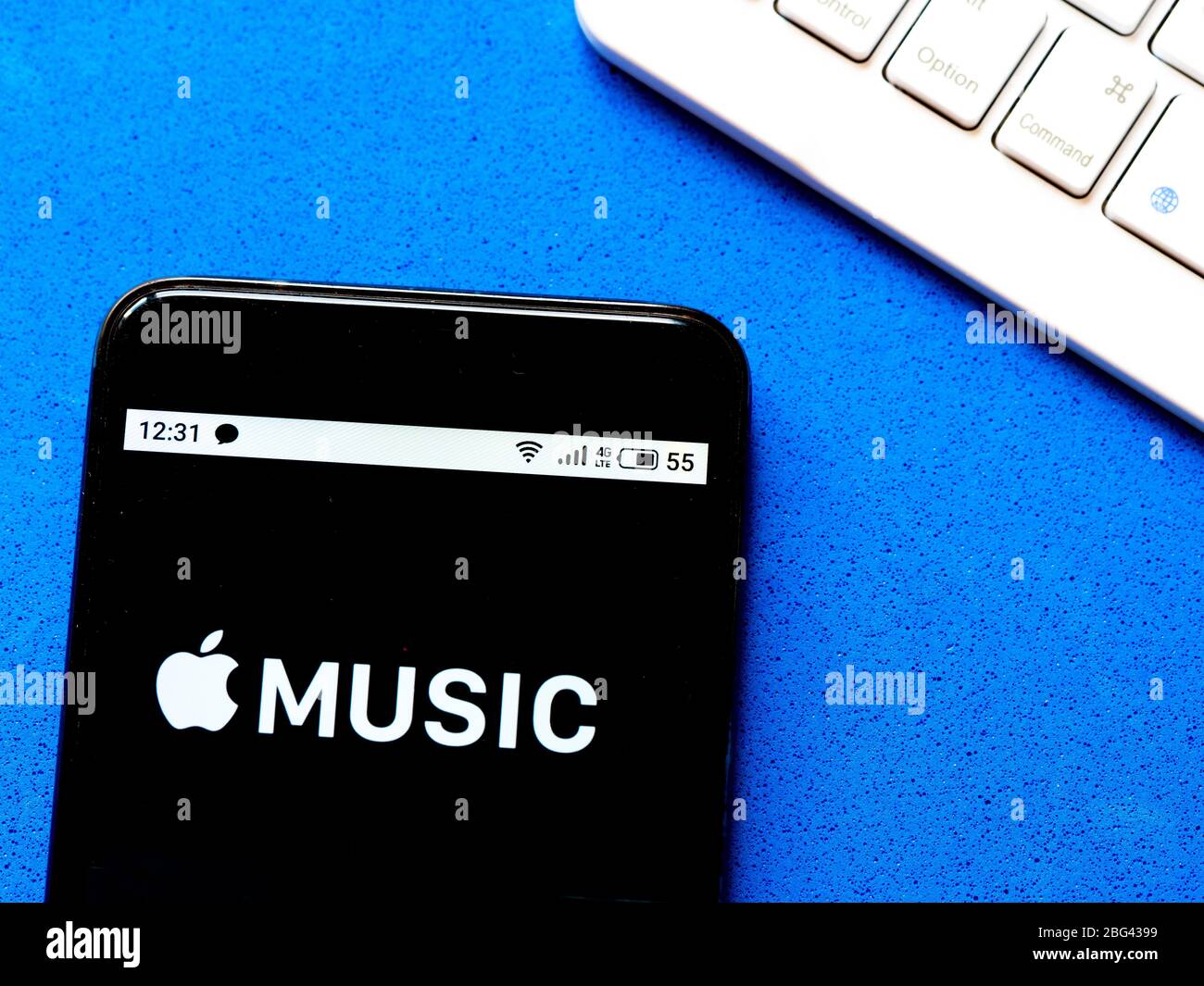 In this photo illustration an Apple Music logo seen displayed on a ...