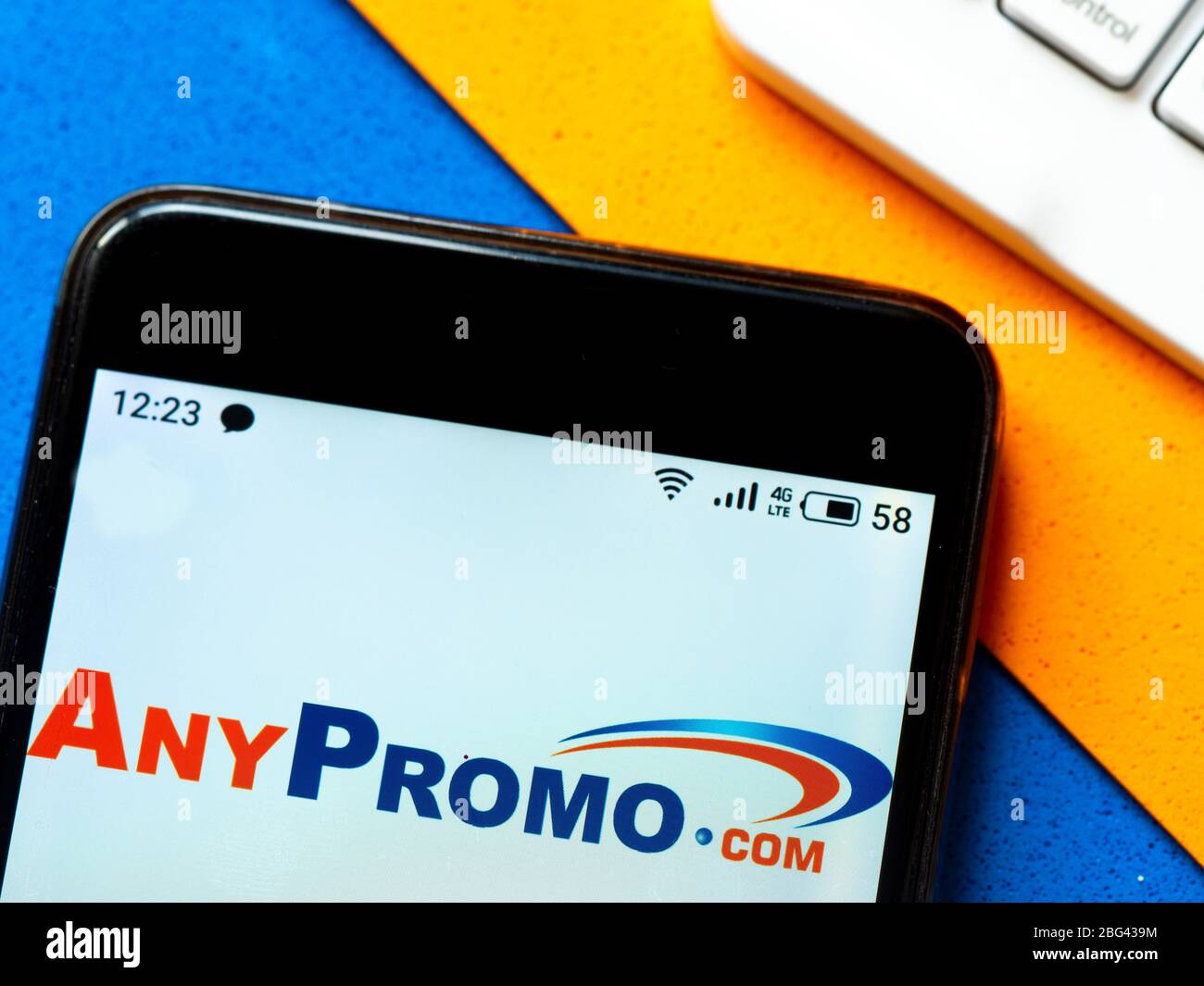 In this photo illustration an AnyPromo logo seen displayed on a ...