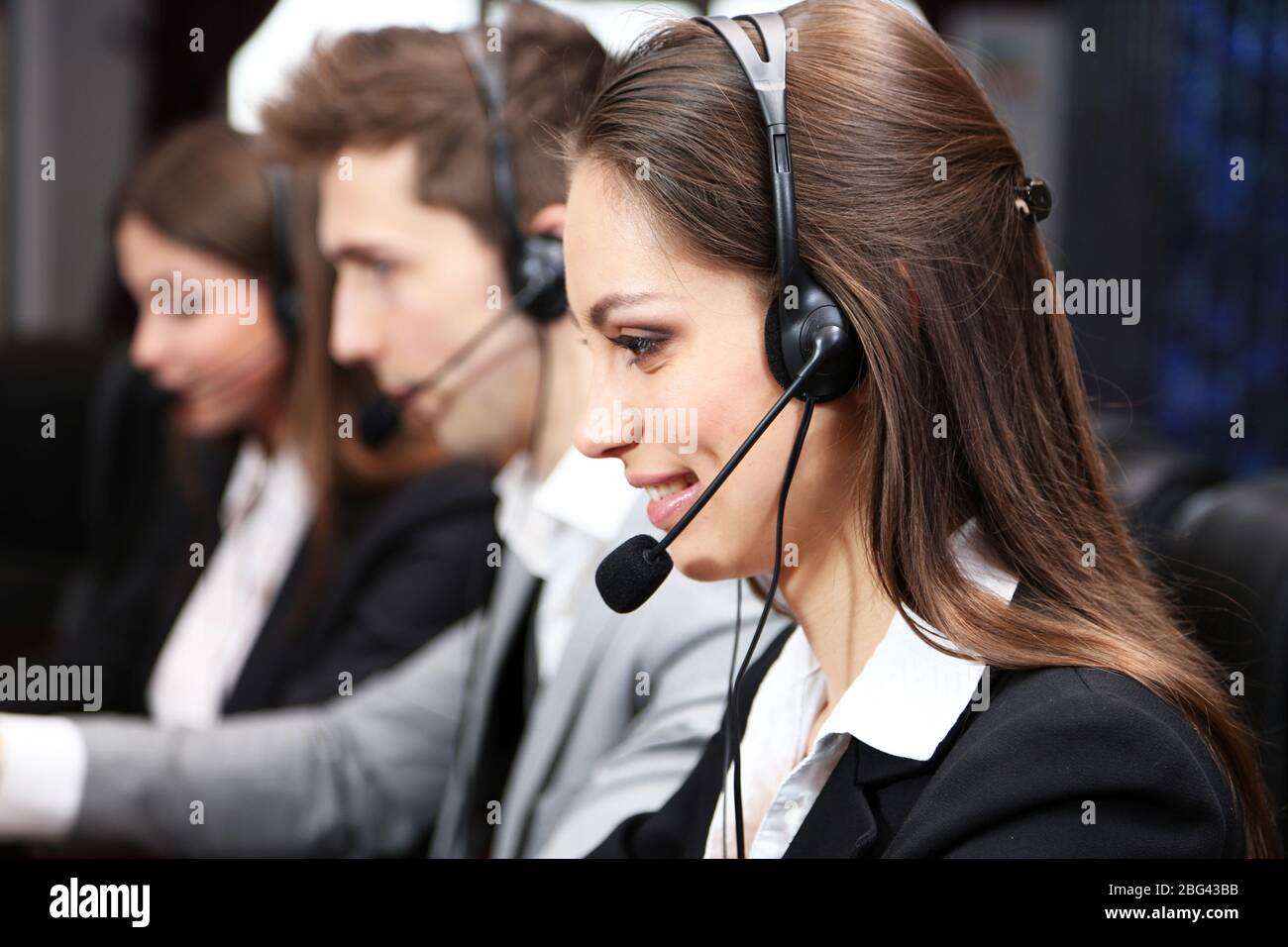 Male call center workers sitting hi-res stock photography and images - Alamy