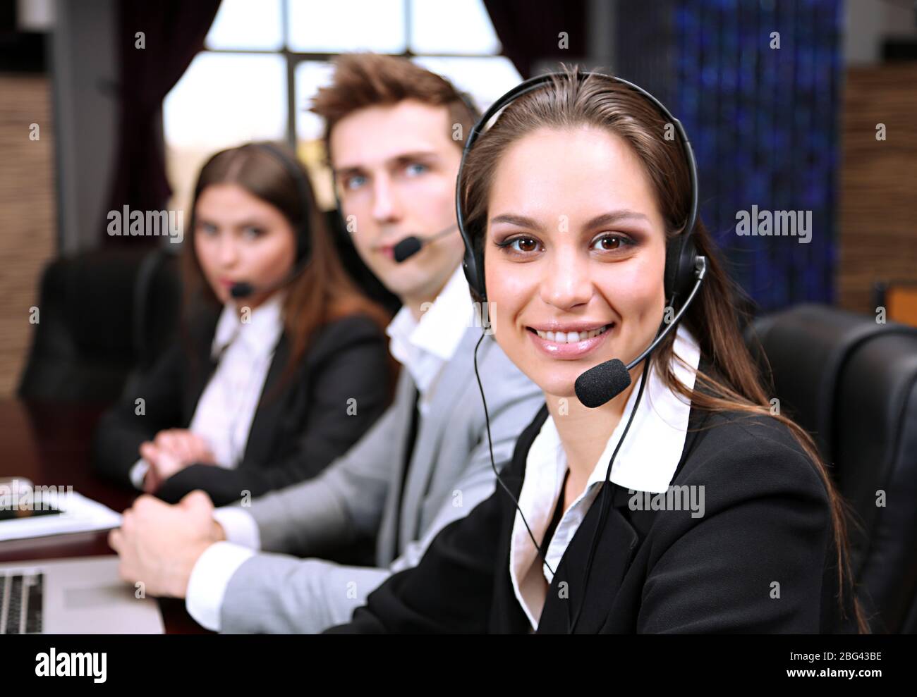 Call center operators at work Stock Photo - Alamy