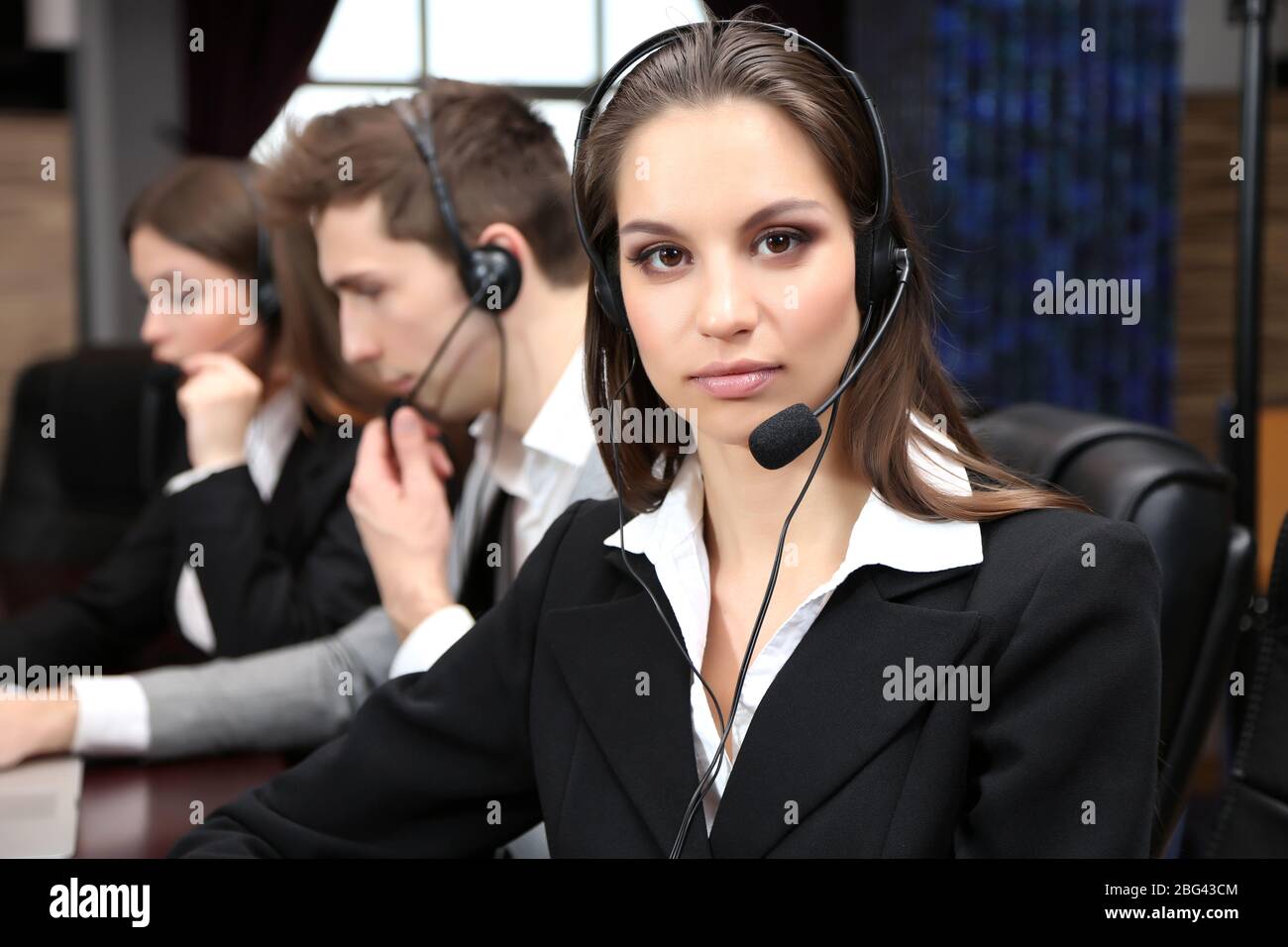 Call center operators at work Stock Photo - Alamy