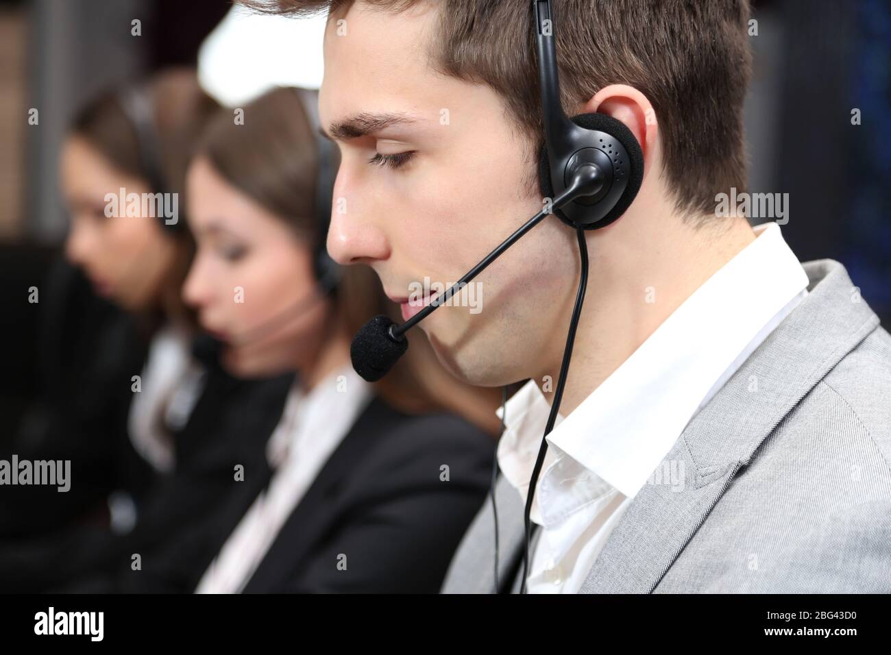 Call center operators at work Stock Photo - Alamy