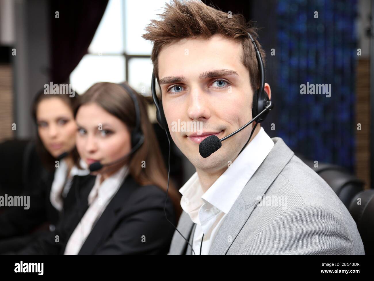 Call center operators at work Stock Photo - Alamy