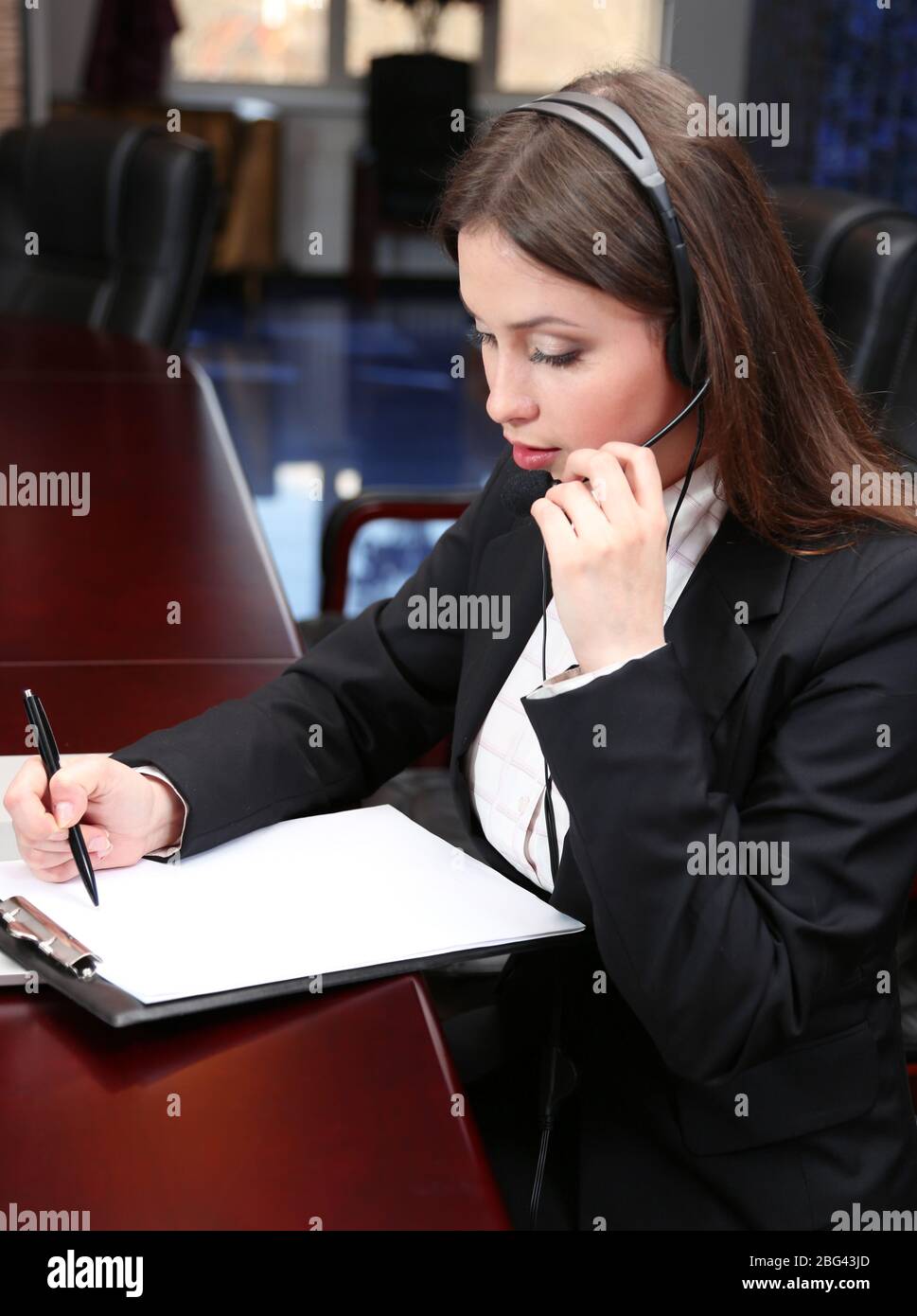 Call center operator at work Stock Photo - Alamy