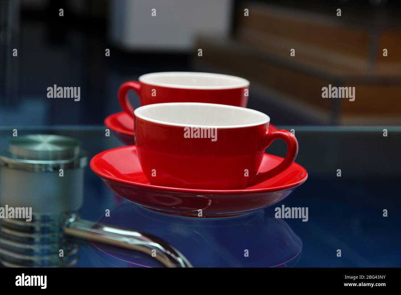 Two cups of coffee on office table Stock Photo - Alamy