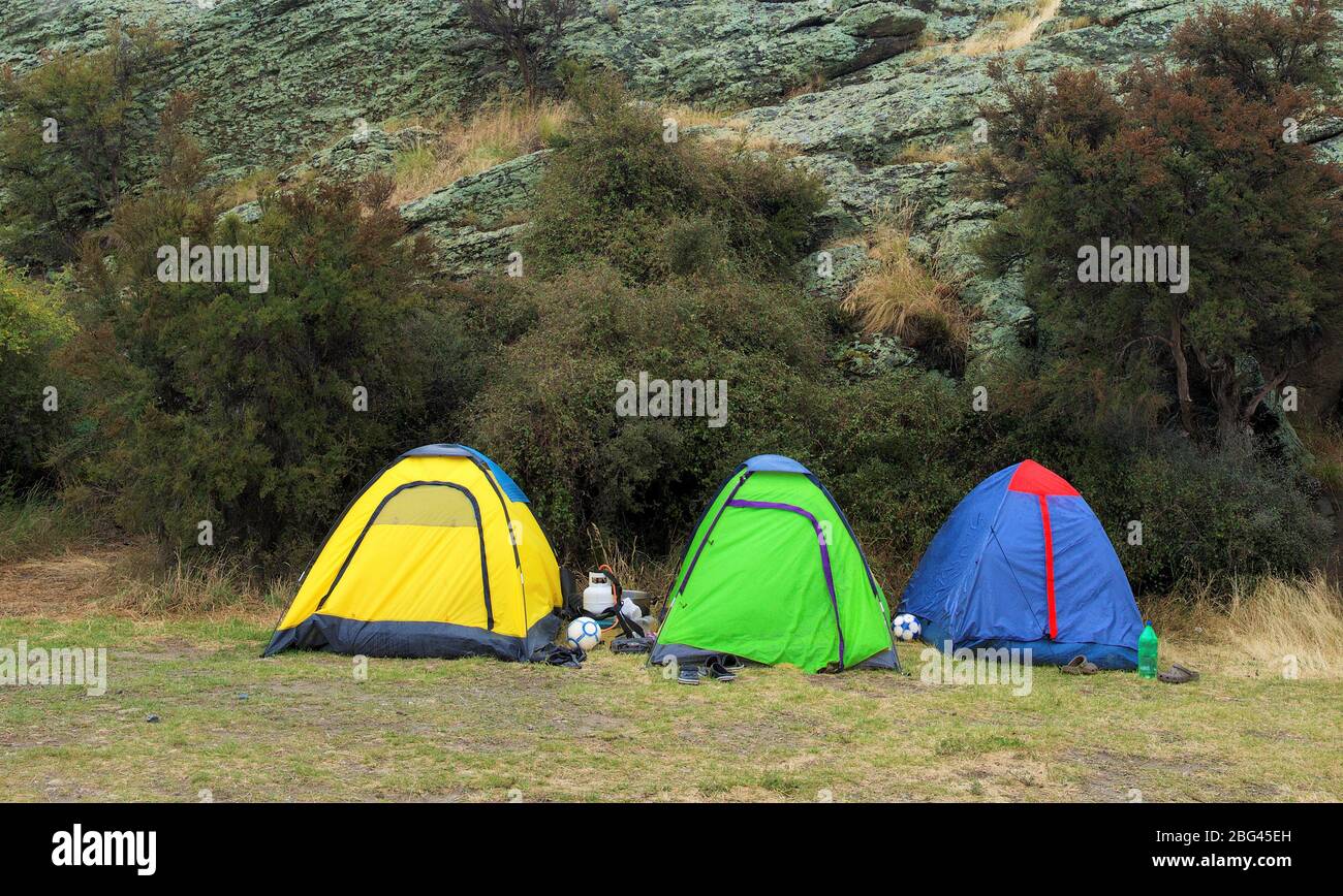 Three tents in a rural landscape, New Zealand Stock Photo - Alamy