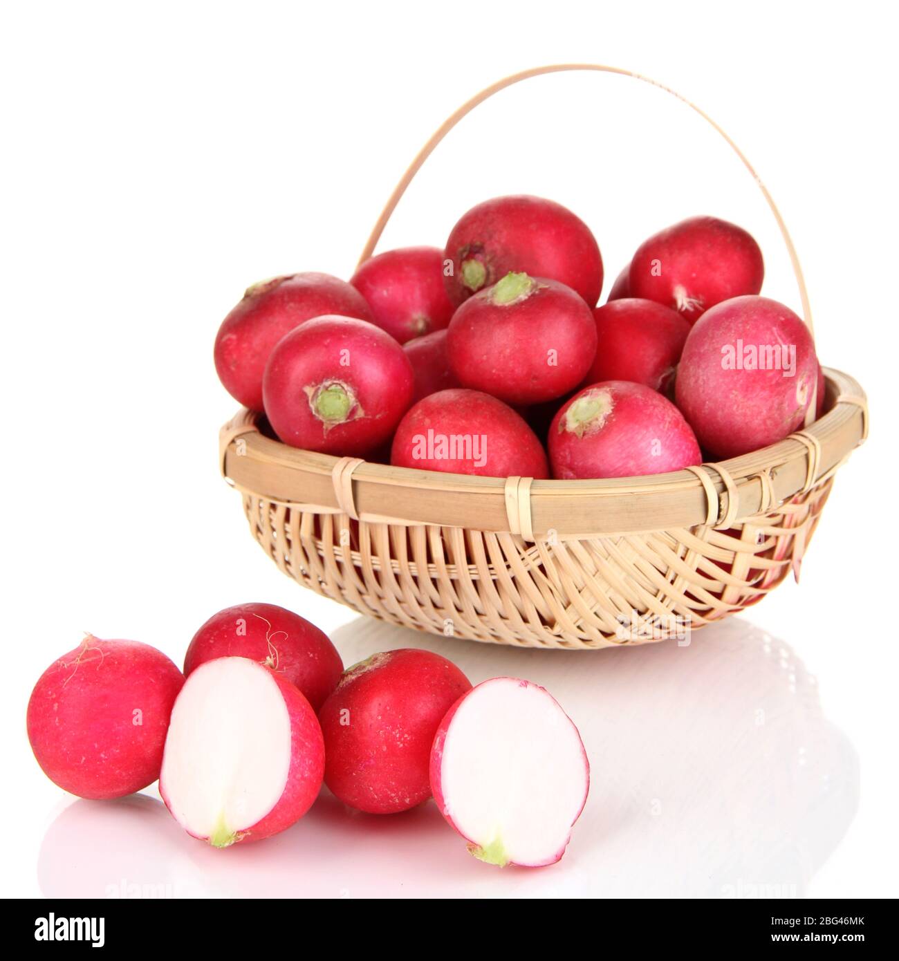 Small garden radish in wicker basket isolated on white Stock Photo - Alamy