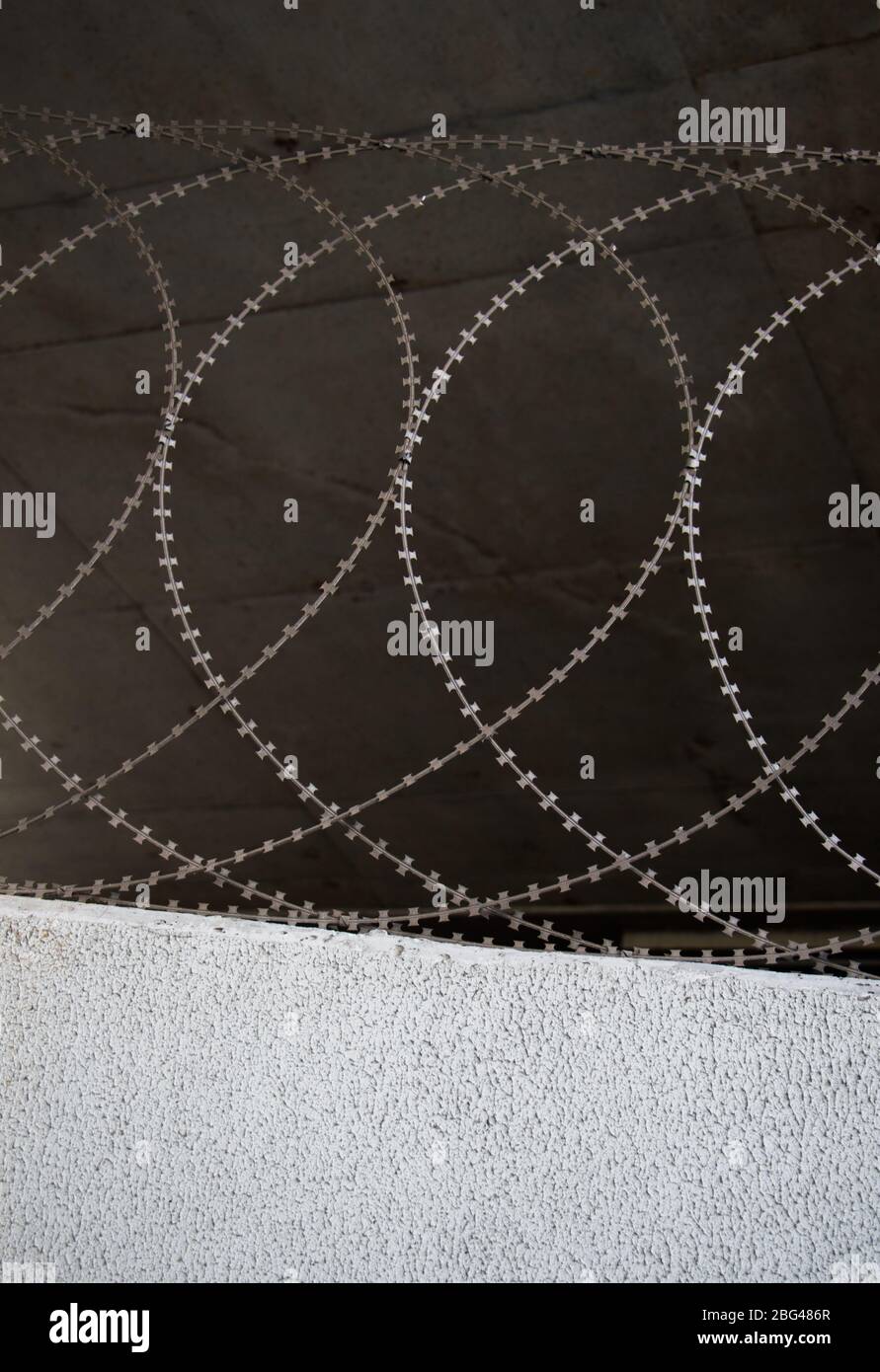 barbed wire fence used for protection purposes Stock Photo - Alamy